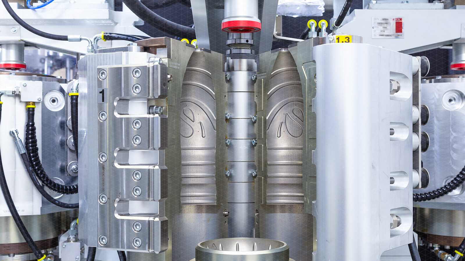 Blow molding machines and PET preform production systems by SACMI. | SACMI